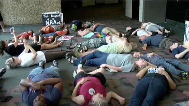 Anti-Gun Protestors Stage 'Die-In' At Ted Nugent Concert Venue | MRCTV